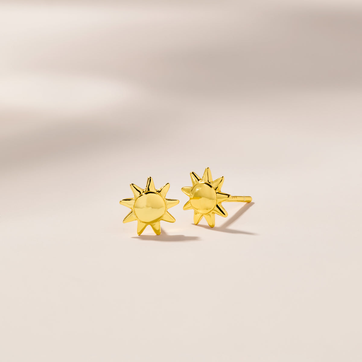 Gold sun stud earrings store